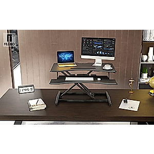 FEZIBO Standing Desk Converter Stand up Desk Riser, 34 inches Height Adjustable Ergonomic Tabletop Workstation Riser Fits Dual Monitors Black