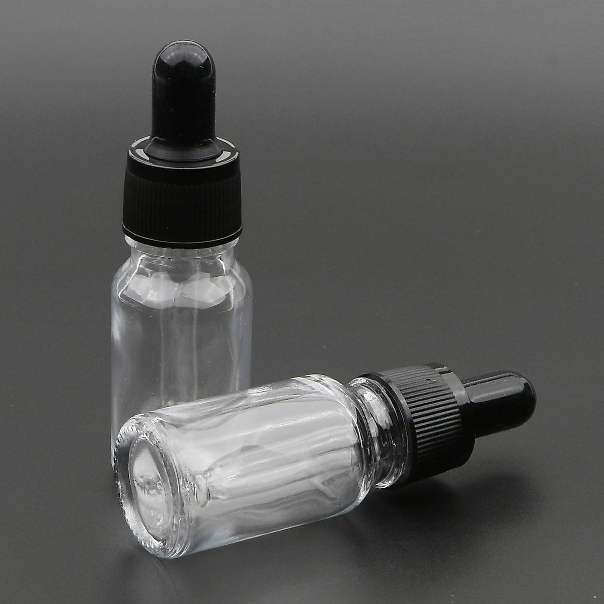 Kesell Glass Bottles for Essential Oils - 10ml Refillable Empty Transparent/Clear Bottle with Glass Dropper and Black Cap, Pack of 20