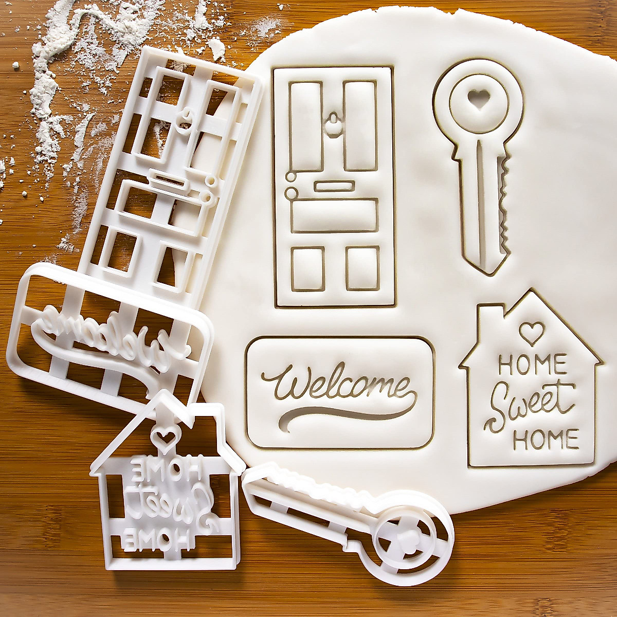 Set of 4 Housewarming cookie cutters (Home Sweet Home, House Door, House Key, and Welcome Mat), 4 pieces - Bakerlogy