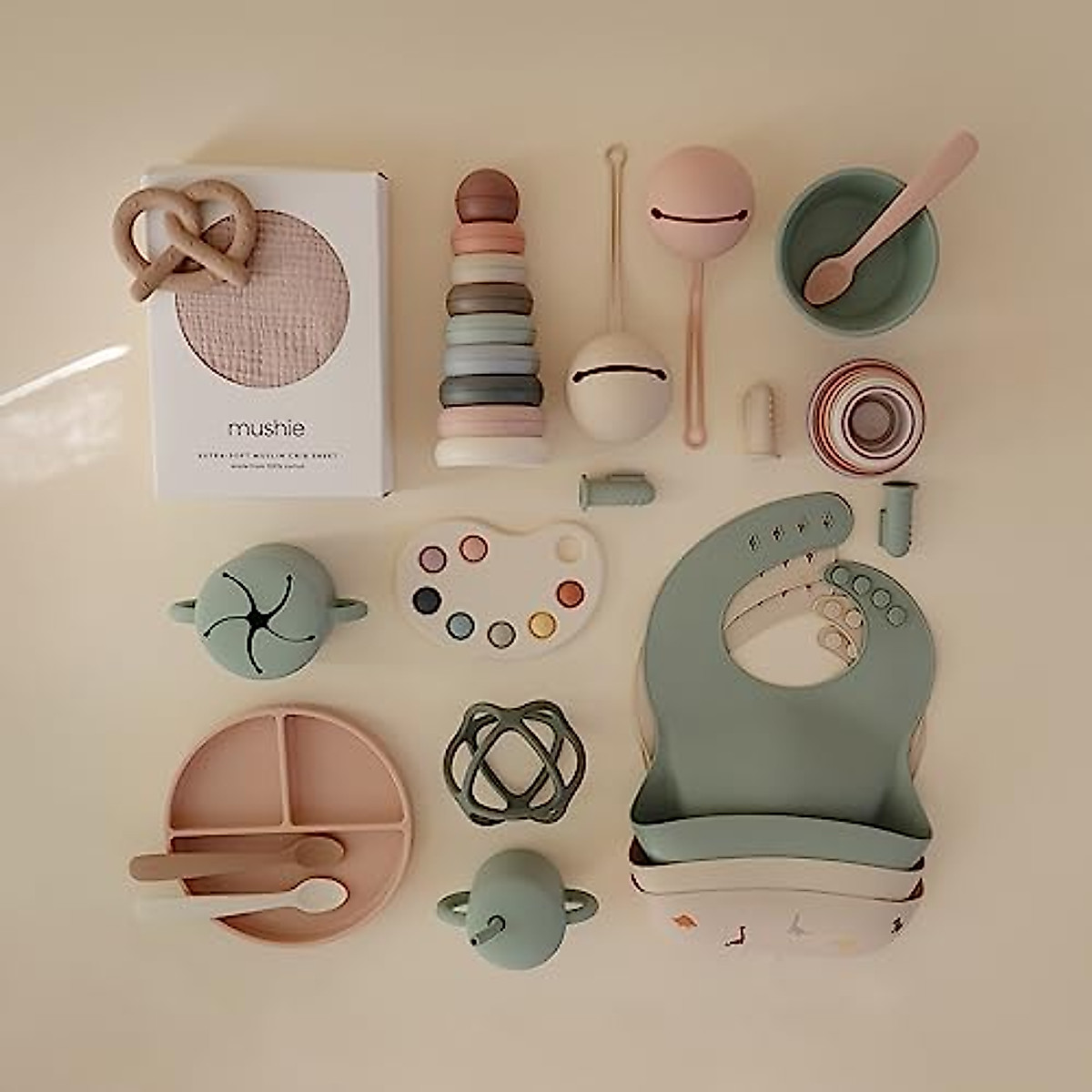 mushie Silicone Baby Bib | Adjustable Fit Waterproof Bibs (Dinosaurs)