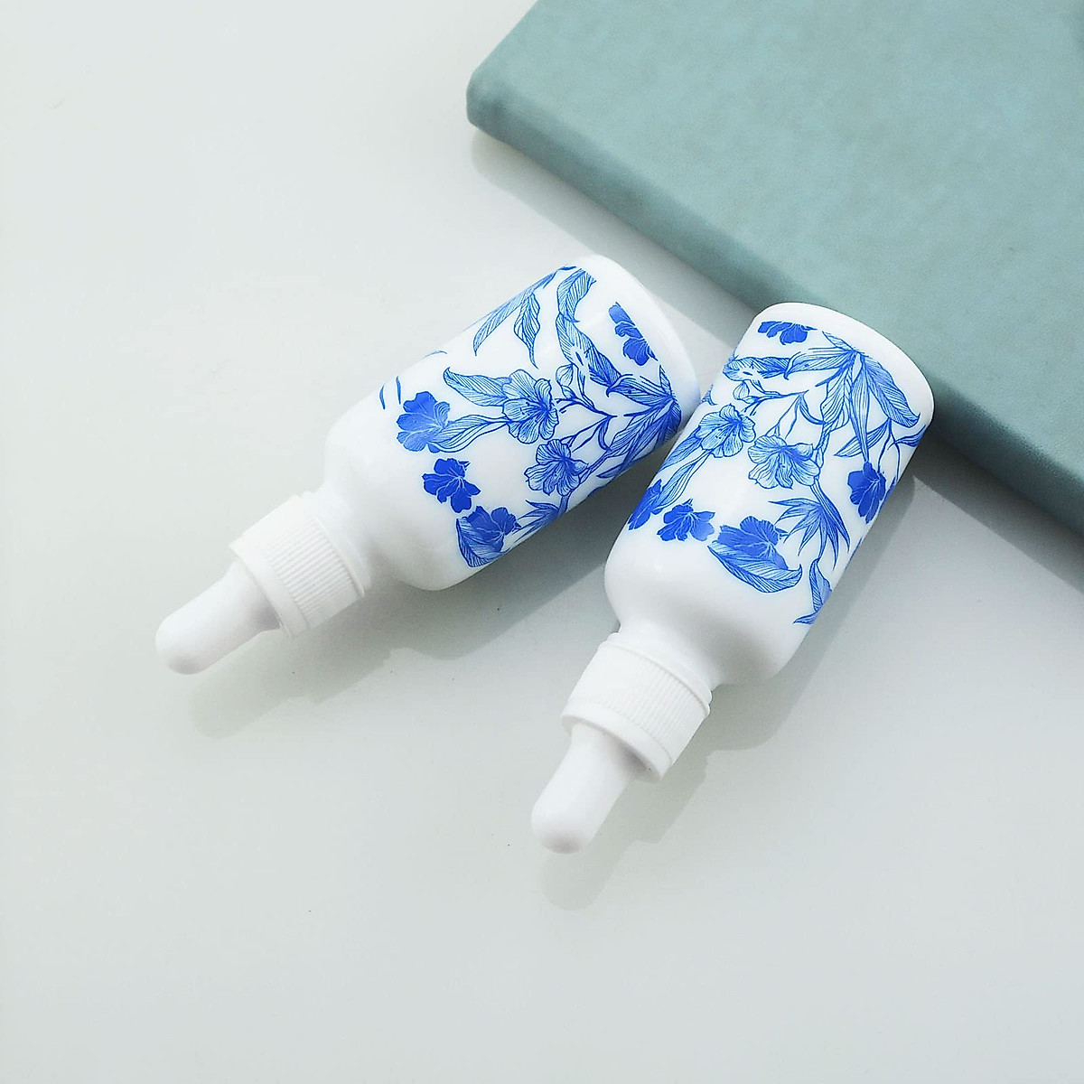 Wwolife 4 PCS 1 2/3oz (50ml) Blue and White Porcelain Ceramic Dropper Bottles Perfume Aromatherapy Cosmetic Container Essential Oils Sample Empty Dropper Bottles with Funnel Include