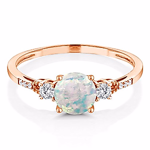 Gem Stone King 10K Rose Gold 6MM Round Gemstone Birthstone White Created Sapphire and White Diamond Accent 3-Stone Engagement Ring | Three-Stone Wedding Anniversary Promise Ring For Women