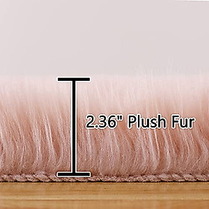COZYLOOM Faux Fur Rug, Luxury Soft Faux Sheepskin Rug, 2x3 FT Pink Furry Rug Chair Couch Cover Seat Pad for Bedroom Bedside Living Room, Kids Room or Nursery, Floor Sofa Decor