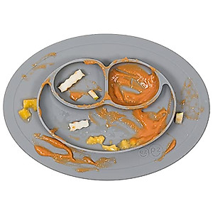 ezpz Mini Mat - 100% Silicone Suction Plate with Built-in Placemat for Infants + Toddlers - First Foods + Self-Feeding - Comes with a Reusable Travel Bag (Gray)