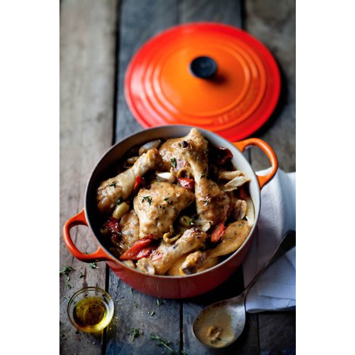 Enameled Cast Iron Round French Oven Color: Flame, Size: 7.25-qt.