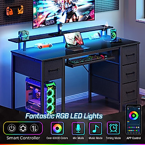 Seventable Computer Desk 47.2" with LED Lights & Power Outlets, Home Office Desk with 4 Drawers, Writing Desk with Keyboard Tray, Study Desk with Monitor Stand, Work Desk for Home Office, Black