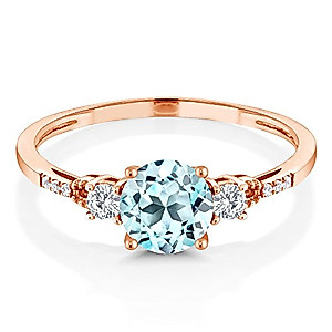 Gem Stone King 10K Rose Gold 6MM Round Gemstone Birthstone White Created Sapphire and White Diamond Accent 3-Stone Engagement Ring | Three-Stone Wedding Anniversary Promise Ring For Women