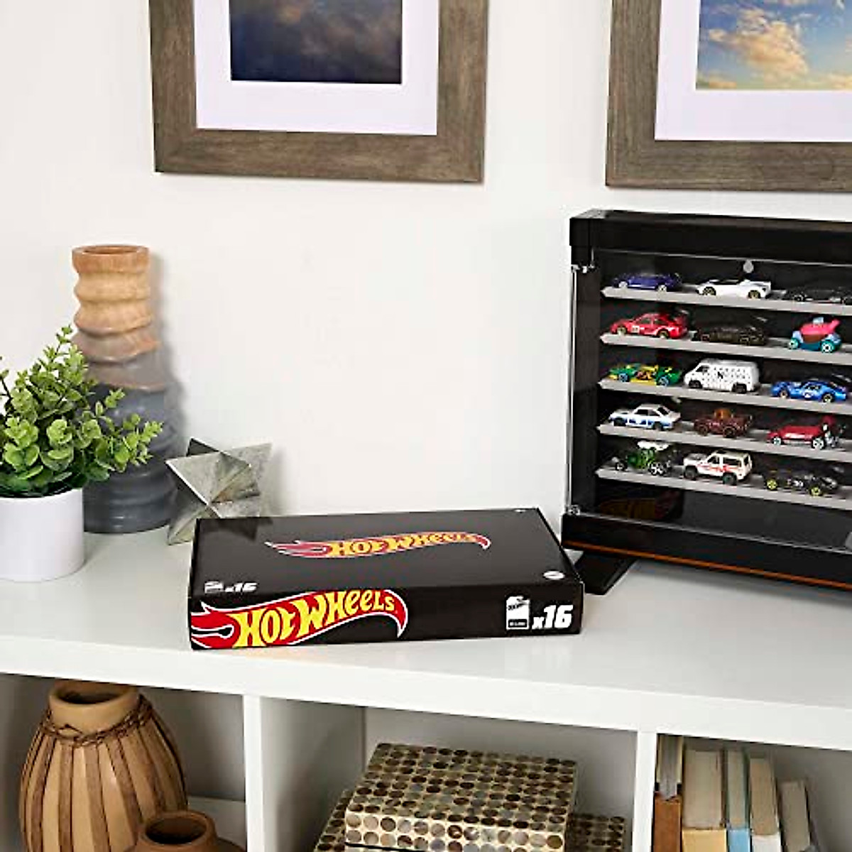 Hot Wheels Basics Black Box, 16 First-Appearance Toy Cars in 1:64 Scale, Possibly Includes a Treasure Hunt Car, Toy for Collectors & Kids 3 Years Old & Older