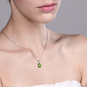 Gem Stone King 10K White Gold Green Peridot and Diamond Pendant Necklace For Women (1.80 Cttw, Gemstone Birthstone, Oval 9X7MM With 18 Inch Chain)