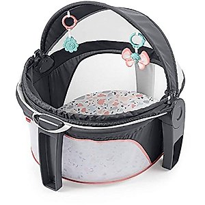 Fisher-Price Portable Bassinet and Play Space On-The-Go Baby Dome with Developmental Toys and Canopy, Pink Pacific Pebble