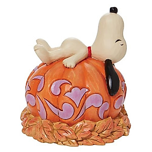 Enesco Peanuts by Jim Shore Halloween Snoopy Laying on Carved Pumpkin Figurine, 5.5 Inch, Multicolor