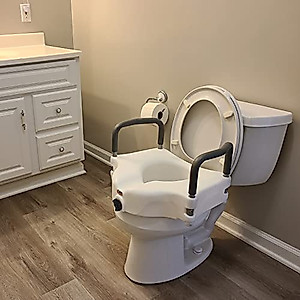 Carex 4.5 Inch Raised Toilet Seat with Arms - For Elongated Toilets, Elevated Toilet Riser with Removable Padded Handles, Easy On and Off, 300lb Weight Capacity, White