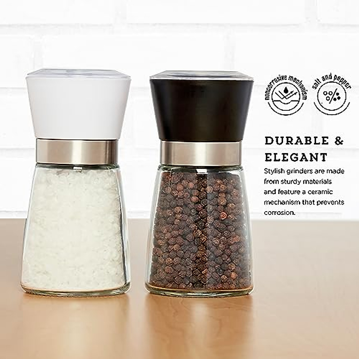 Kamenstein Top Manual Grinders, Adjustable Grind Filled with Sea Salt and Black Peppercorns, Black and White, Set Of 2