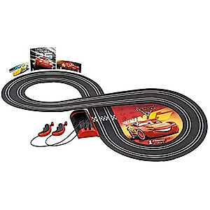 Carrera First Disney/Pixar Cars 3 - Slot Car Race Track - Includes 2 cars: Lightning McQueen and Dinoco Cruz - Battery-Powered Beginner Racing Set for Kids Ages 3 Years and Up