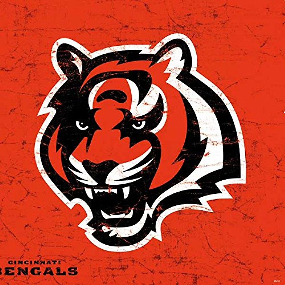 Skinit Decal Gaming Skin Compatible with PS4 Slim Bundle - Officially Licensed NFL Cincinnati Bengals - Alternate Distressed Design