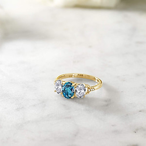 Gem Stone King 10K Yellow Gold London Blue Topaz White Topaz and Diamond Accent Engagement Ring For Women (2.22 Cttw, Oval Gemstone Birthstone, Available in size 5, 6, 7, 8, 9)