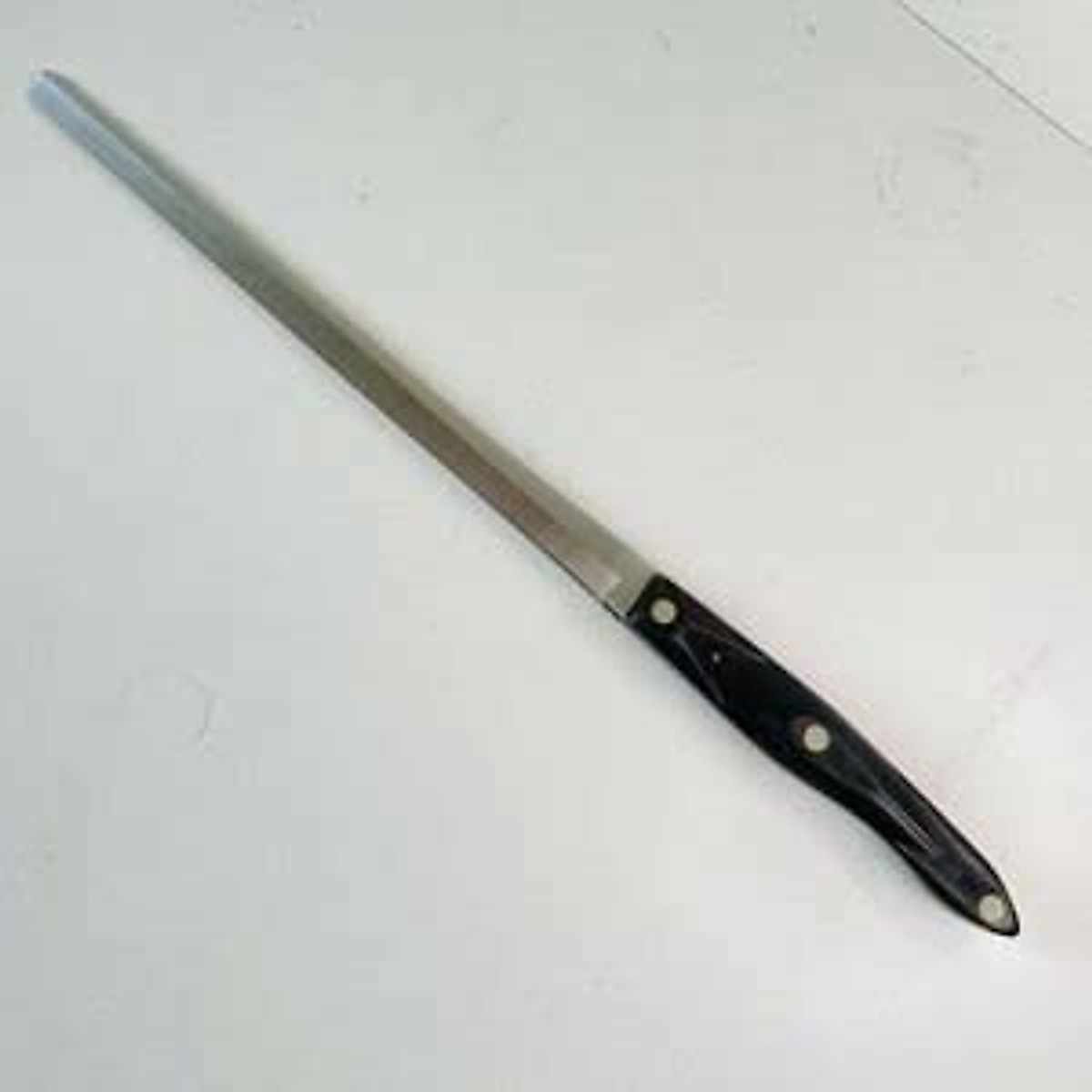 CUTCO Model 1724 Slicer...........9.8" High Carbon Stainless Double-D® (DD) serrated blade.......5.7" Classic Brown handle (sometimes called black)...........in factory-sealed plastic bag.