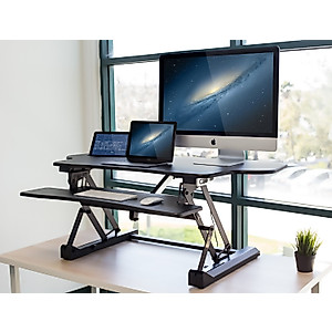 Mount-It! Electric Standing Desk Converter, 48 Inch Extra Wide Motorized Sit Stand Desk with Built in USB Port, Ergonomic Height Adjustable in Black (MI-7962)