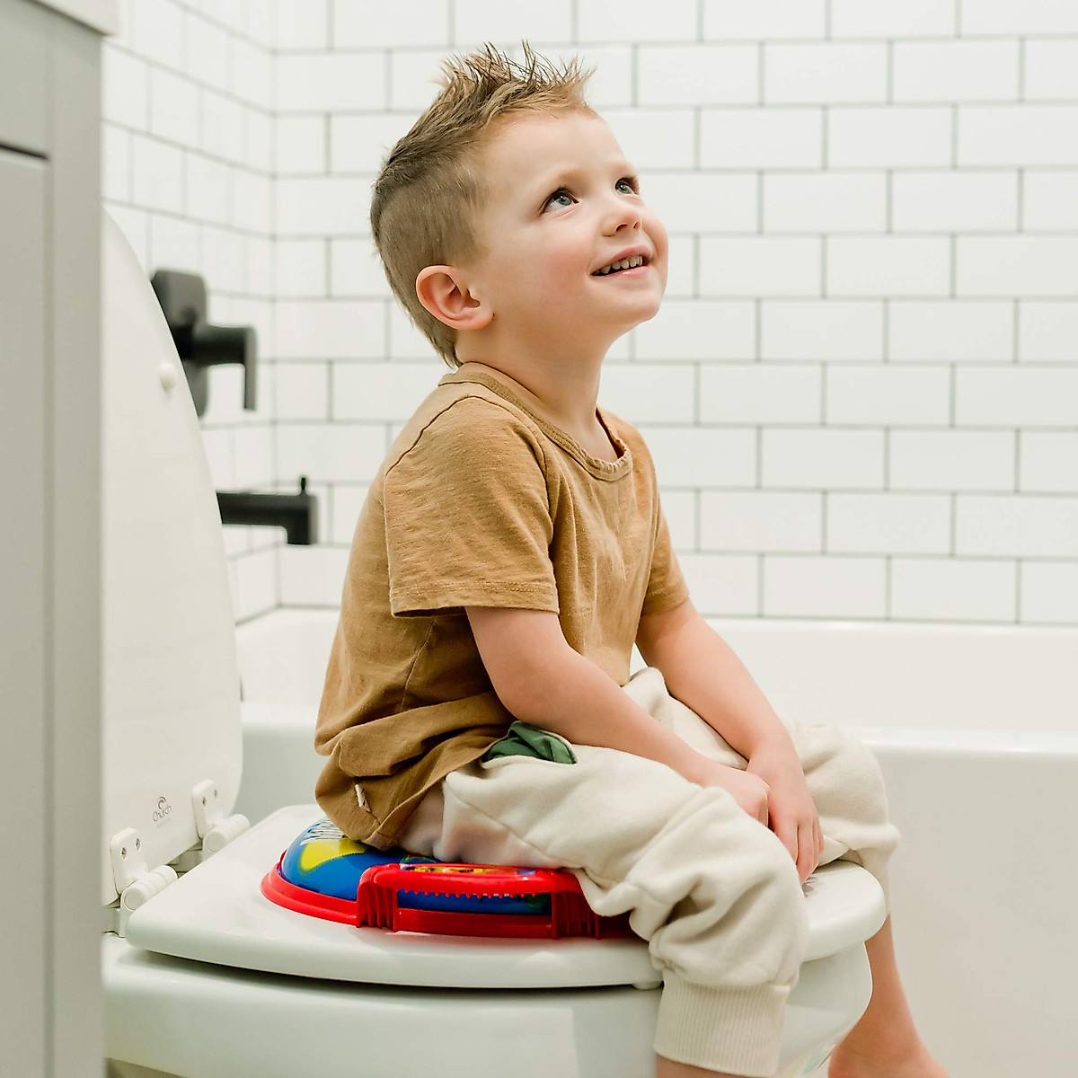 The First Years Disney Mickey Mouse Soft Potty Seat - Cushioned Toddler Toilet Seat Attachment - Toddler Potty Training Toilet Seat with Handles - Ages 18 Months and Up