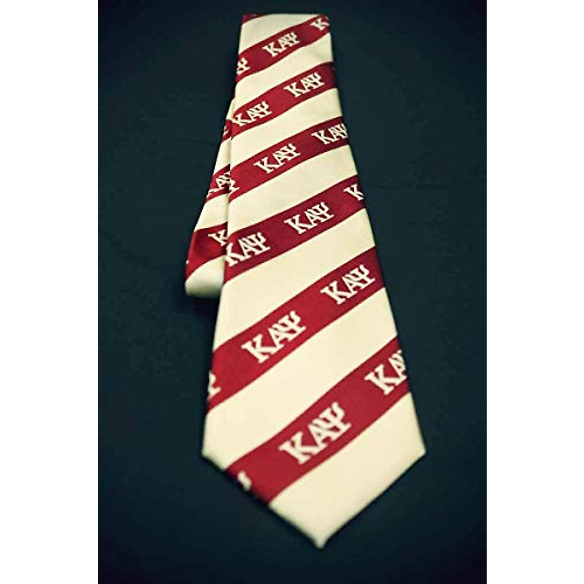 Kappa Alpha Psi Greek Letter Neck Tie. Comes in Crimson & Cream.
