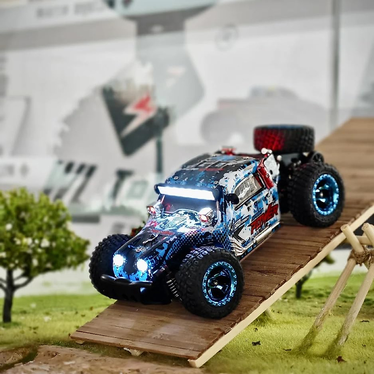 WLtoys 2.4G 4WD 1/28 30KM/H Brushed RC Monster Truck Off-Road Full Proportional Remote Control Car with LED Lights, RC Transmitter And Car Battery - RTR RC Toy Vehicle (RC Cars, RC Truck) (HELIDIRECT)