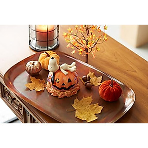 Enesco Peanuts by Jim Shore Halloween Snoopy Laying on Carved Pumpkin Figurine, 5.5 Inch, Multicolor