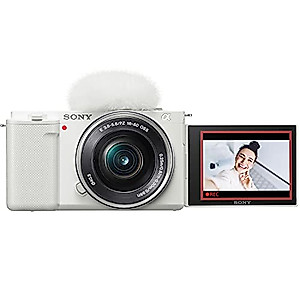 Sony ZV-E10 Mirrorless Camera 2 Lens Vlogger Kit 16-50mm + 55-210mm ILCZV-E10L/W White Bundle with ACCVC1 Including GP-VPT2BT Grip + Filters + Wide & Telephoto Lenses + Deco Gear Case & Accessories
