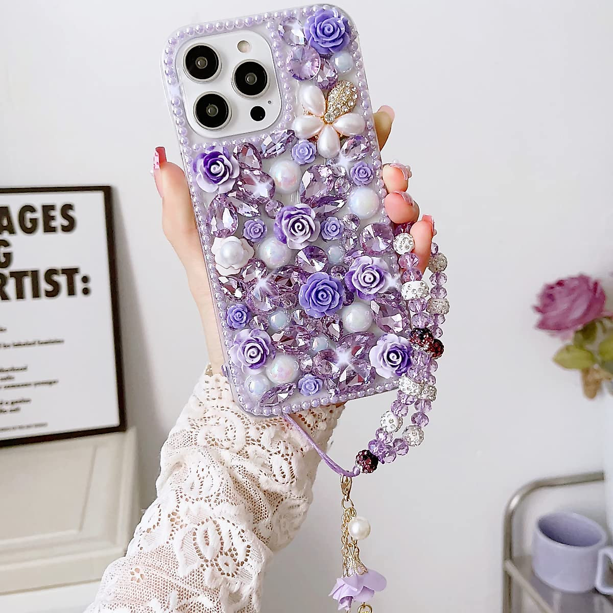 Changjia for iPhone 14 Pro Max Glitter Bling Case, Girly Cute Luxury 3D Crystal Rhinestone Flowers Diamond Pearl with Lanyard Wrist Strap Women Girls Case Cover for iPhone 14 Pro Max 6.7 inch (Purple)