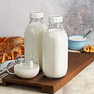 Dwbligt 32 oz Reusable Glass Milk Bottles with Silicone Dispenser Cap, 2 Pack Glass Jars with Airtight Screw Lid, Leak Proof Glass Juice Bottles with Scale Mark for Fridge