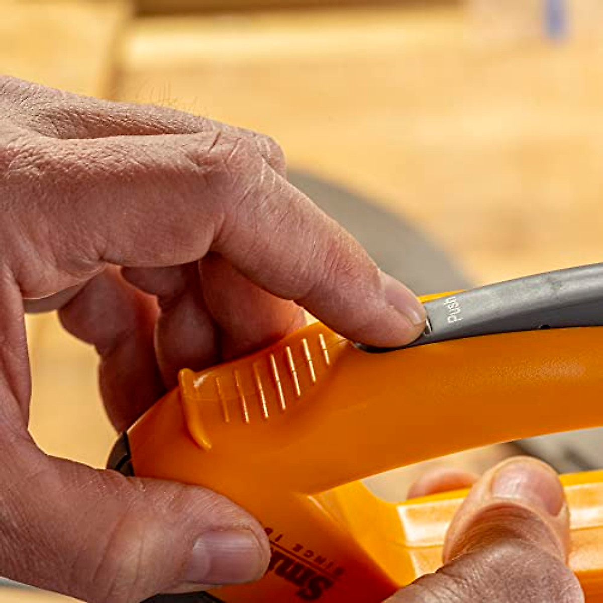 Smith’s 50582 Axe & Machete Sharpener - Axe, Machete, Hatchet, & Mower Tools - Large Handle w/ Finger Guard - Handheld Manual - Replaceable Carbide Blades - Wire-Bristled Cleaning Brush - Durable