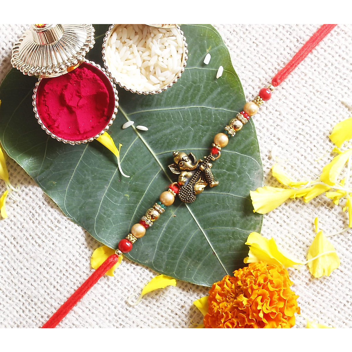 ARTISENIA Majestic Ganesha Playing Veena Rakhi for Brother Raksha Bandhan Rakhi Thread Bracelet Wrist bands for Loving Brother Sister