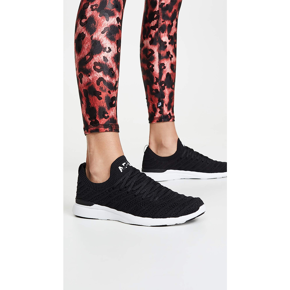 APL: Athletic Propulsion Labs Women's Techloom Wave Sneakers, Black/White, 6.5 Medium US