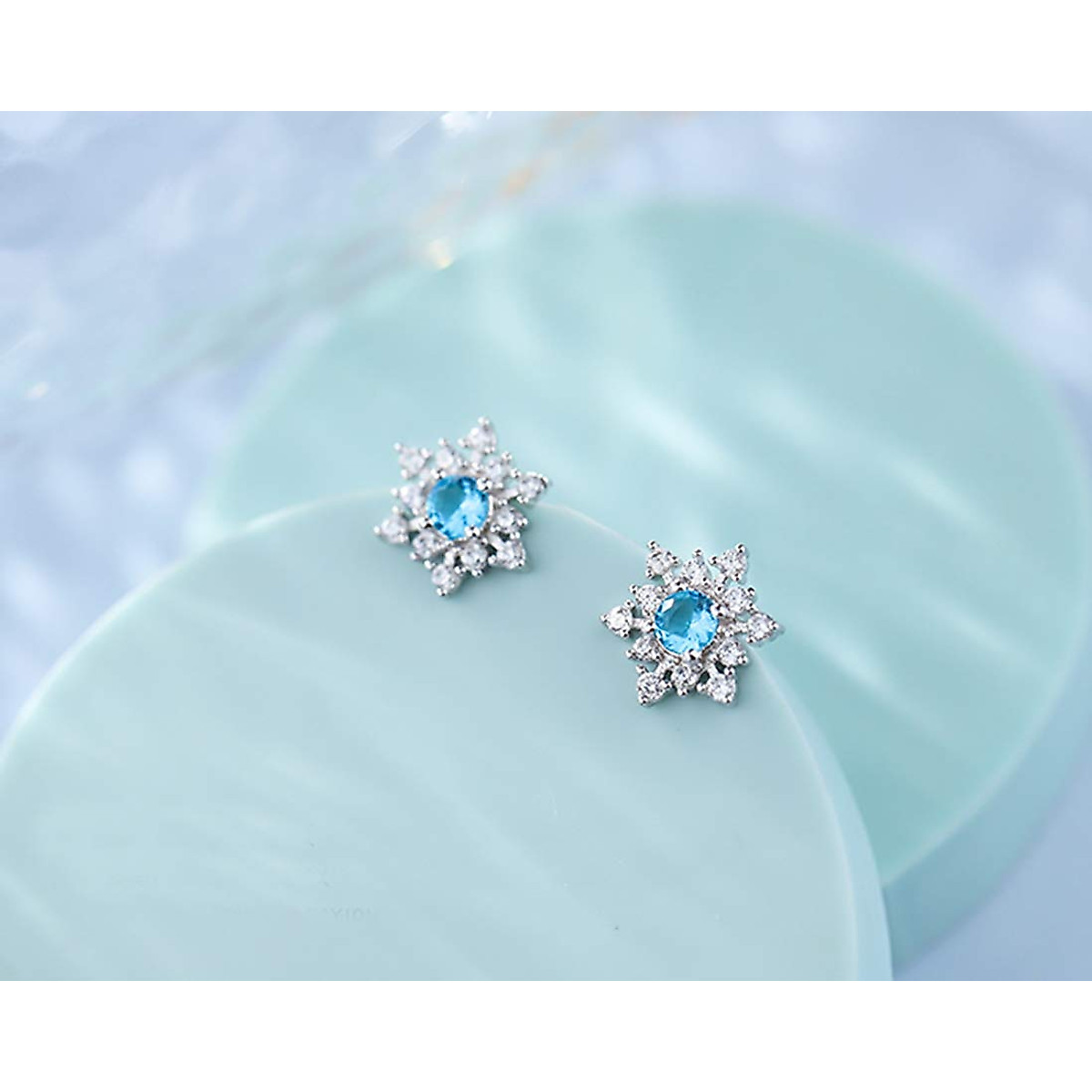 SLUYNZ 925 Sterling Silver Sparkling Blue Crystal Snowflake Studs Earrings for Women Pretty Snowflake Earrings Studs (A-Silver)