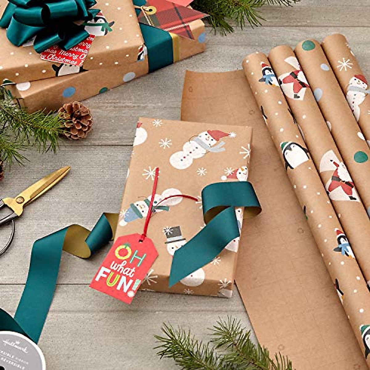 Hallmark Recyclable Kraft Christmas Wrapping Paper for Kids with Cut Lines on Reverse (4 Rolls: 88 sq. ft. ttl) Penguins, Santa, Snowmen, Polka Dots