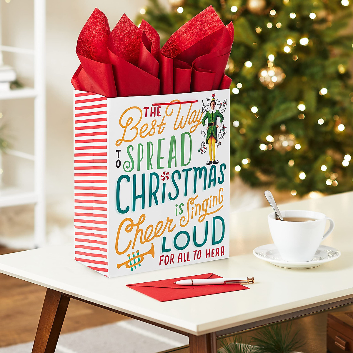 Hallmark 13" Large Elf Gift Bag with Tissue Paper (Movie Quote: "The Best Way to Spread Christmas Cheer…") for Kids, Grandchildren, Adults