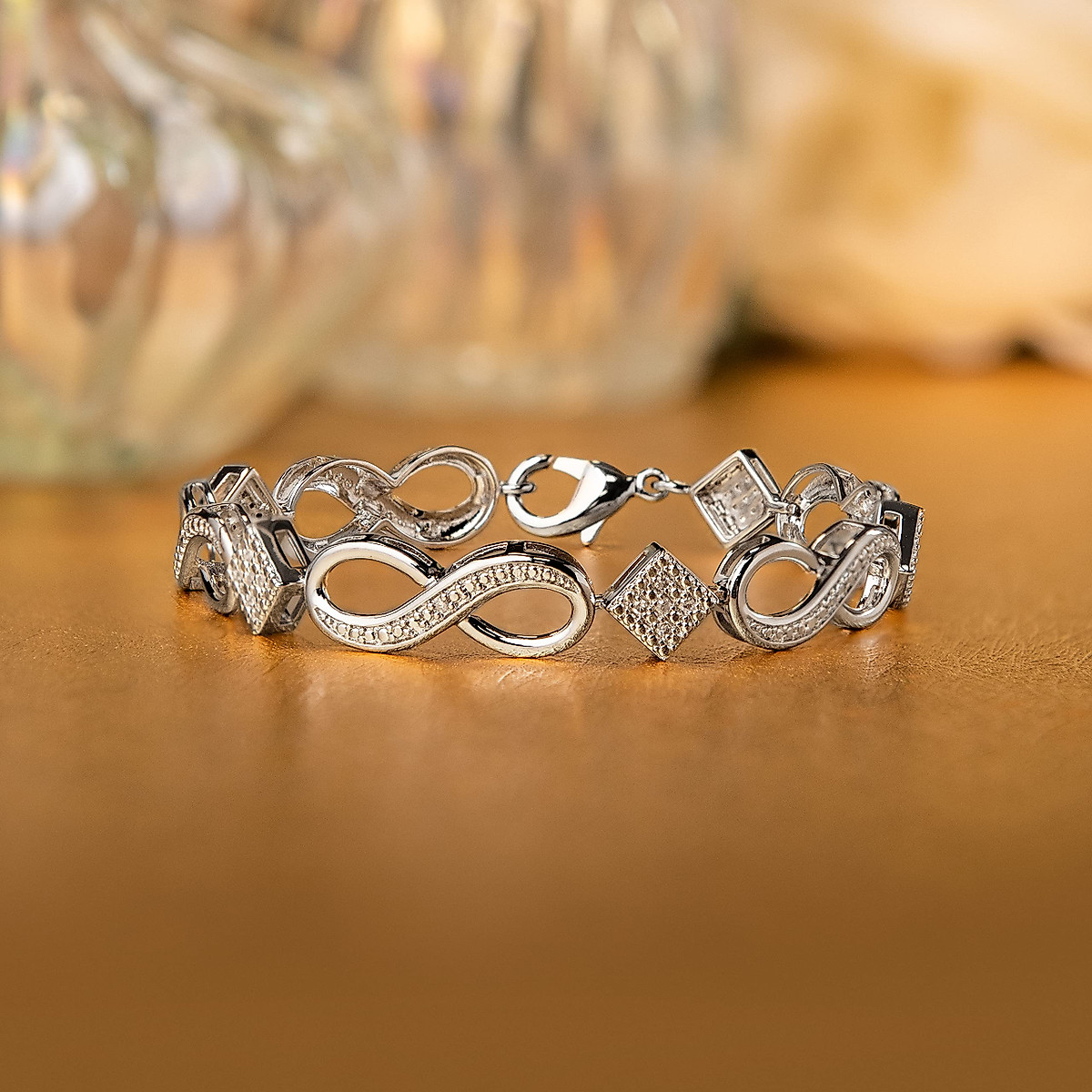 NATALIA DRAKE 1/10 Cttw Diamond Bracelet for Women Infinity Link With Hidden Safety Lock in Rhodium Plated Brass Color I-J/Clarity I2-I3