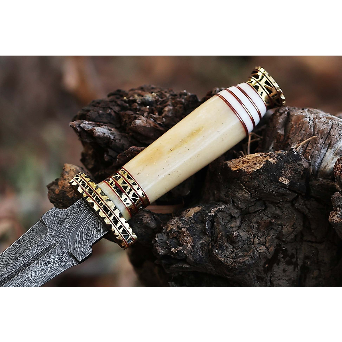 12.5 Inch long Hunting knife, Collectible knife, Natural Camel bone scale embellished with engraved brass finger guard, foil work spacer and pommel, Hand forged Twist pattern Damascus steel blade, Comes with Leather sheath
