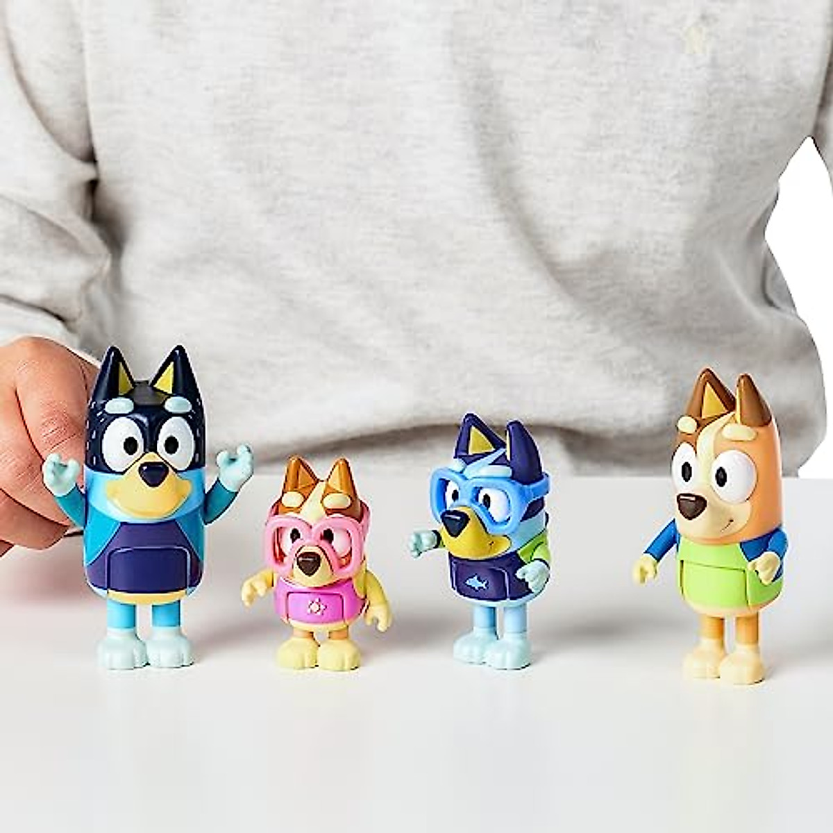 Bluey Figure 4-Pack, Family Beach Day 2.5-3 Inch, Bingo, Bandit and Chilli Character Figures with Accessories