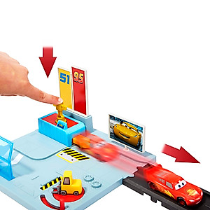 Disney and Pixar Cars On The Road Dinoco Rusteze Racing Center Playset with Lightning McQueen Toy Car, Launcher, Short Track and Spinning Pitty, Toy Gift for Kids, HGV69