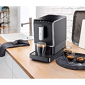 Tchibo Single Serve Coffee Maker Black - Automatic Espresso Coffee Machine with Induction Milk Frother for Rich, Creamy Froth - Built-in Bean Grinder, No Coffee Pods Needed