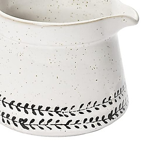 Creative Co-Op Stoneware Creamer with Debossed Pattern, Antique White and Blue Reactive Glaze, 6" L x 4" W x 4" H