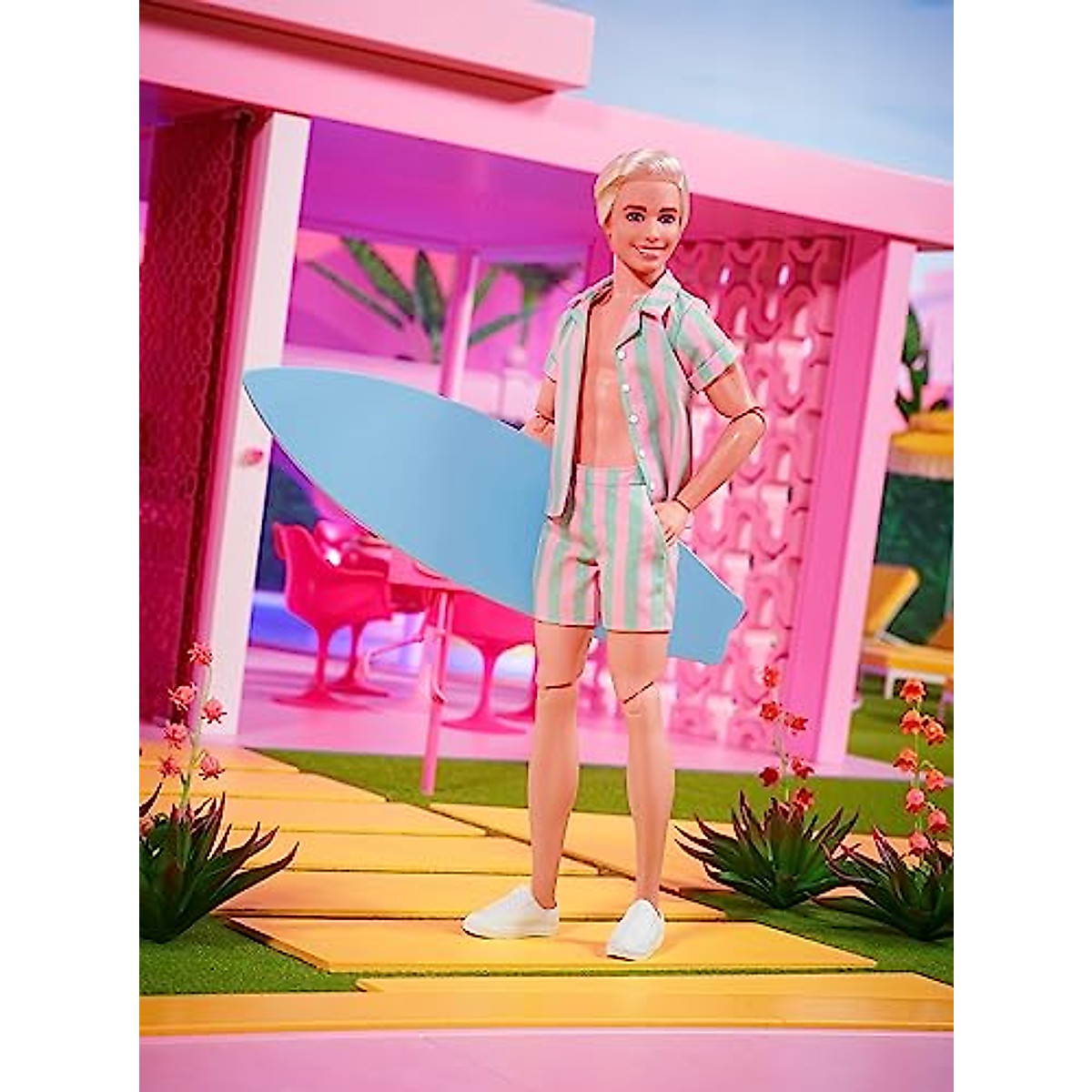 Barbie The Movie Ken Doll Wearing Pastel Pink and Green Striped Beach Matching Set with Surfboard and White Sneakers