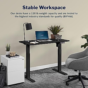 Vari Essential Height Adjustable Electric Standing Desk - Home Office Standing Desk with VariDesk Sturdy T-Legs - Quiet Motorized Standing Desk - 48x24 Inch Small Standing Desk - Black - 1 Box