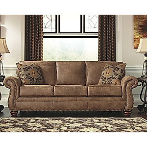 Signature Design by Ashley Larkinhurst Faux Leather Sofa with Nailhead Trim and 2 Accent Pillows, Brown