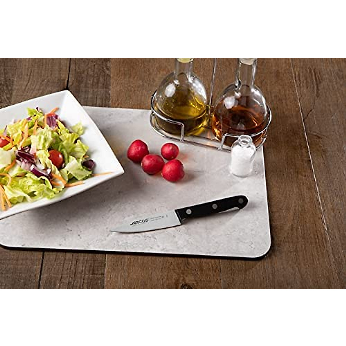 ARCOS Paring Knife 4 Inch Stainless Steel. Professional Knife for Peeling Fruits and Vegetable. Ergonomic Polyoxymethylene Handle and 100 mm Blade. Series Universal. Color Black