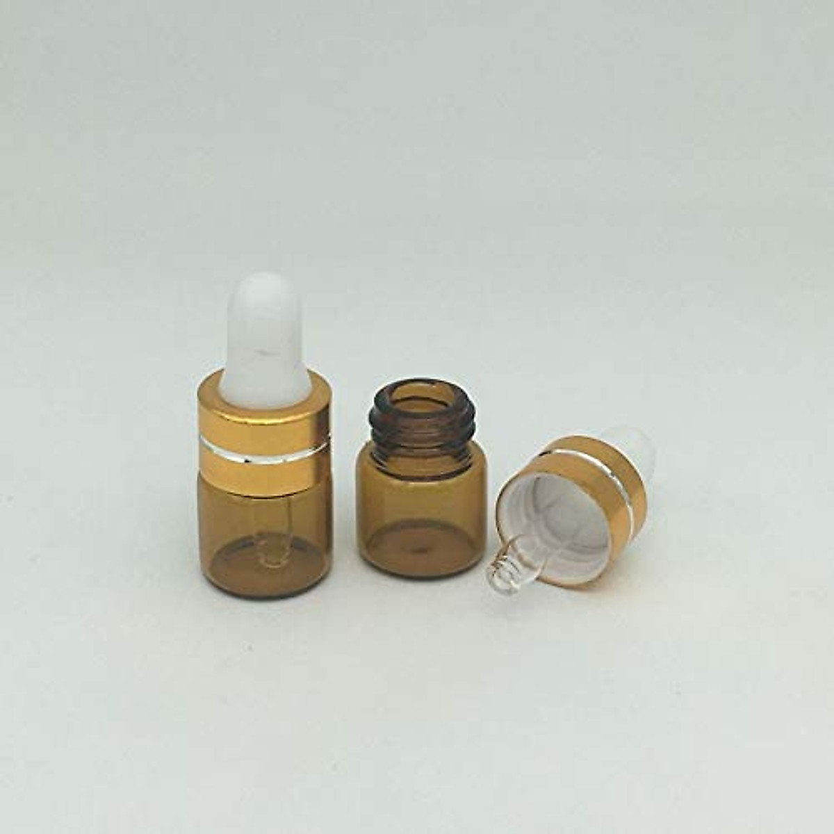 30Pcs Essential Oil Dropping Bottles Refillable Amber Glass Dropper Bottles Portable Perfume Sample Vials Cosmetic Lotion Liquid Containers with Glass Eye Dropper and Caps (1ml)
