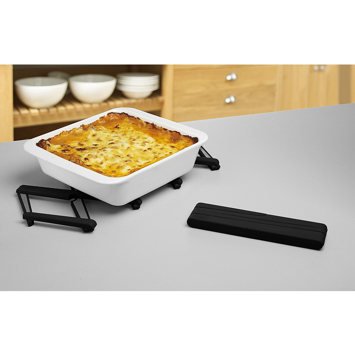 Joseph Joseph Stretch Folding Silicone Trivet for Hot Pot and Pan, Expanding non slip stand, heat resistant mat for Kitchen Countertop - Black