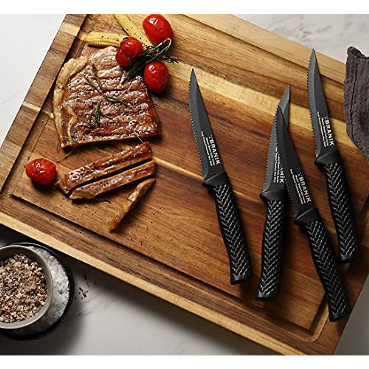 BRANIK Black Steak Knives set of 4, Special Non-Stick Coating on each of these Steak knives making them dishwasher safe. This Black Steak Knife Set is razor-sharp, lightweight, and user-friendly.
