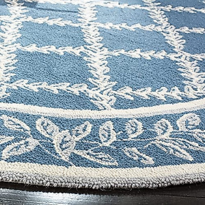 SAFAVIEH Chelsea Collection Area Rug - 4'6" x 6'6" Oval, Navy & Creme, Hand-Hooked French Country Wool, Ideal for High Traffic Areas in Living Room, Bedroom (HK230N)