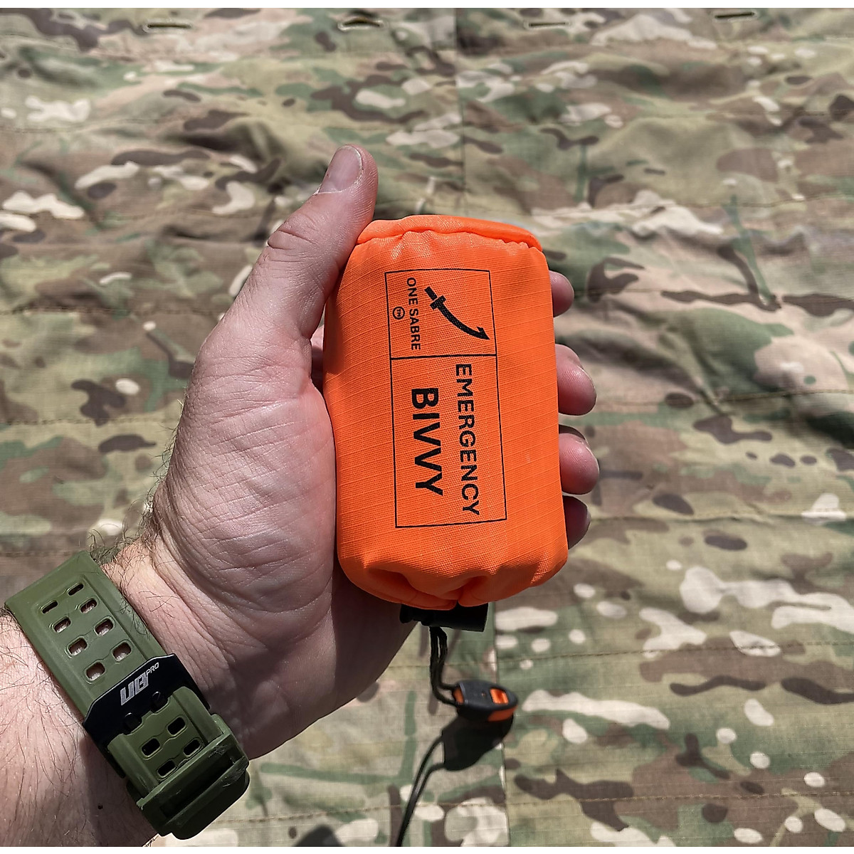 Emergency/Survival Bivvy Bag - Mylar Sleeping Bag, Survival shelter, Reflects 90% Body Heat, Hiking, Camping, Outdoors, Fishing, Hunting, overlanding, Scouts, Ripstop Carry Bag w/Whistle (Orange)